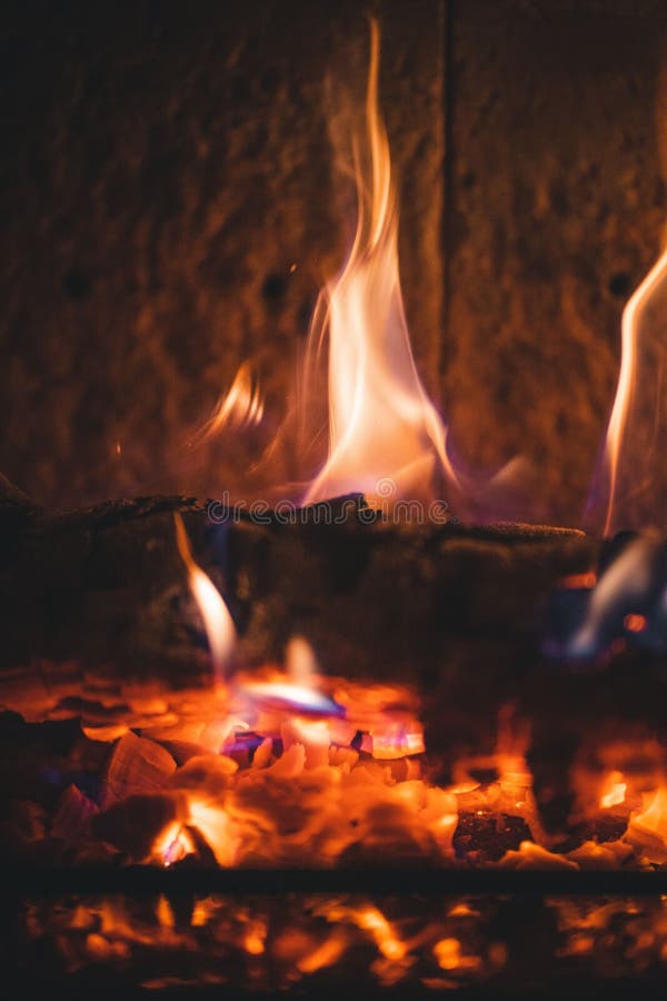 Vertical Shot of Flaming Woods in a Fireplace Stock Illustration ...