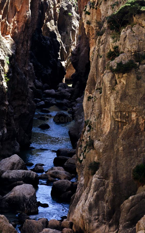 Vertical Shot of a Flowing River in a Narrow Valley Stock Image - Image ...