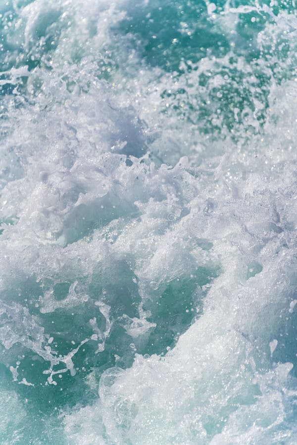 Vertical Shot of a Foamy Splash of the Sea - for Wallpapers Stock Image ...