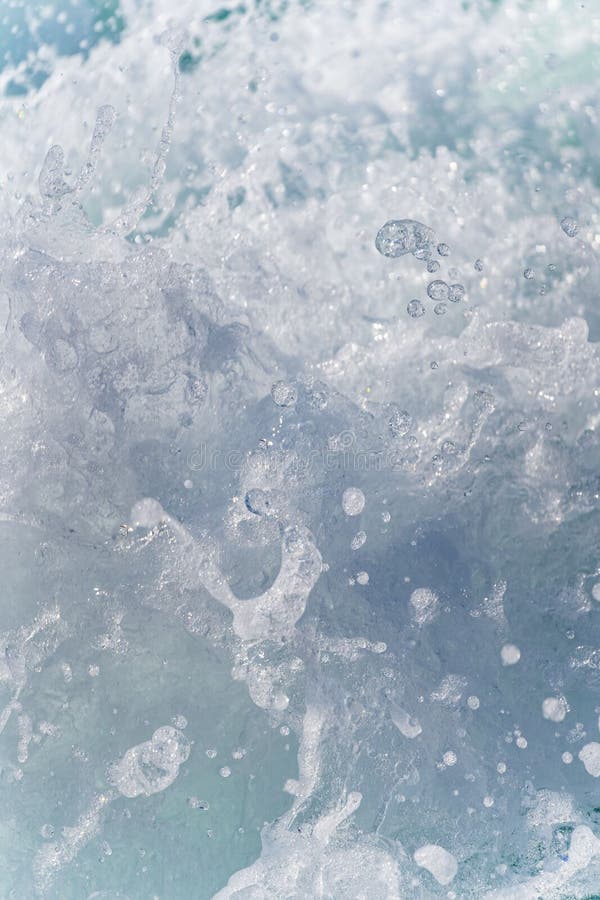 Vertical Shot of a Foamy Splash of the Sea - for Wallpapers Stock Image ...