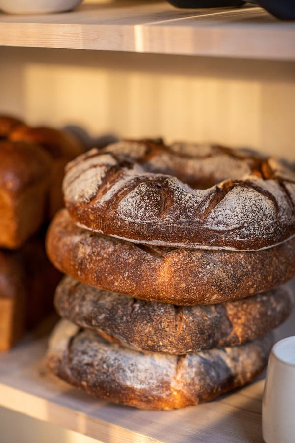 Vertical Shot of the Fresh Assortments of Bread on the Shelf in the ...