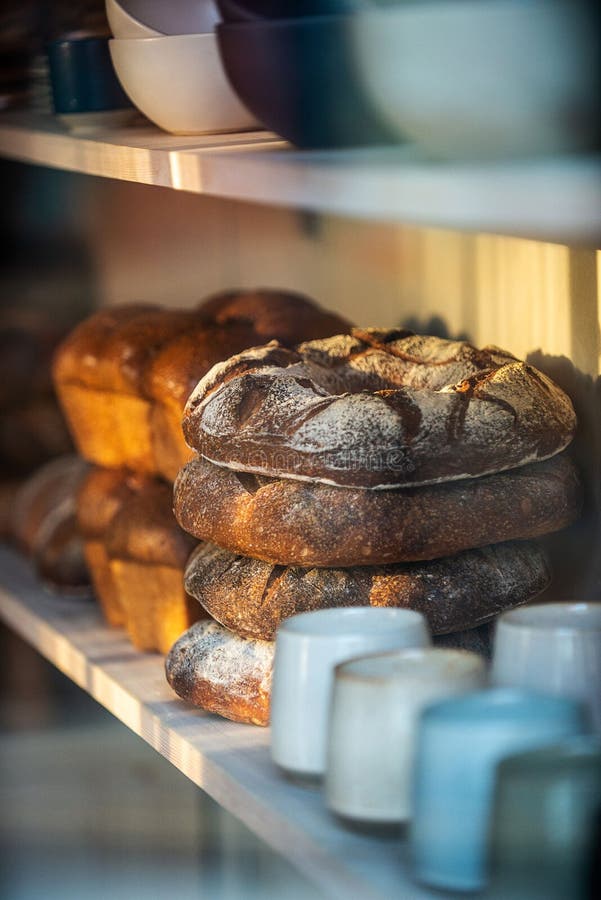 Vertical Shot of the Fresh Assortments of Bread on the Shelf in the ...