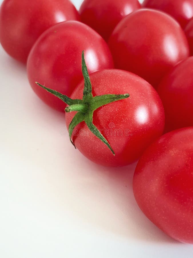 Vertical Shot of a Fresh Tomato on an Open Book Stock Image - Image of ...
