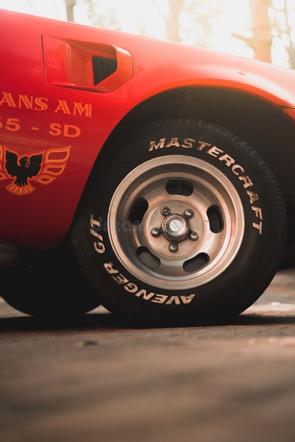 Vertical Shot of the Front Wheel of the American Red Pontiac Firebird ...