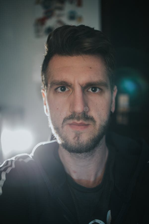 Vertical Shot of a Frowned Caucasian Male Stock Image - Image of ...