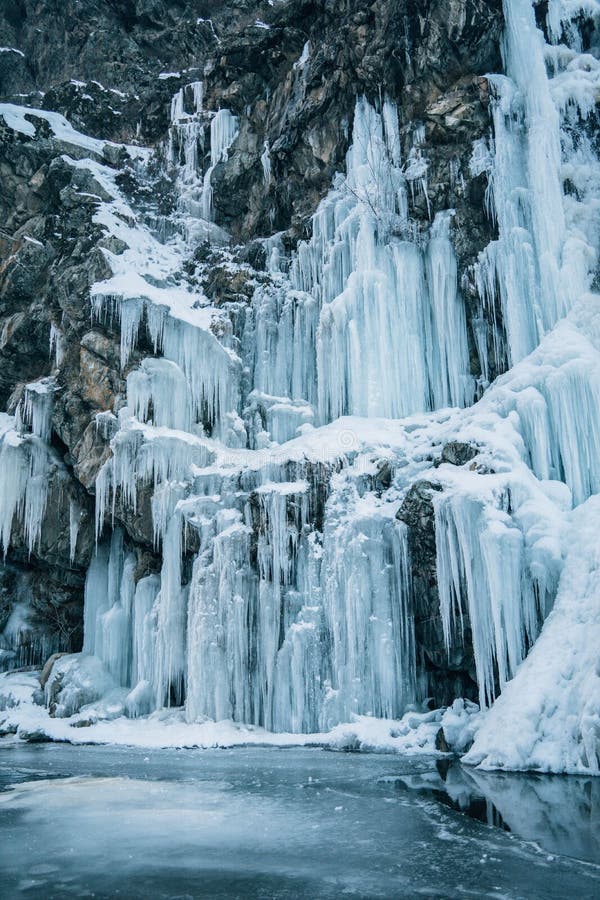 Vertical Shot of a Frozen Waterfall in Kashmir Stock Photo - Image of ...
