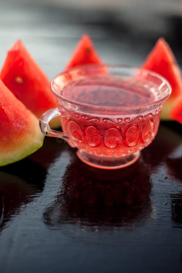 Fruit Ice Tea of Watermelon Seeds in a Transparent Glass Cup on Wooden ...