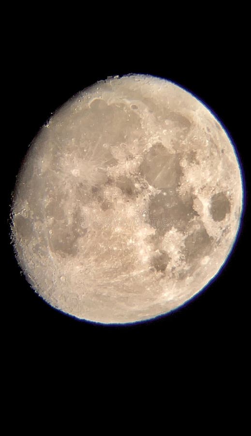 Vertical Shot of the Full Moon on the Black Surface Stock Photo - Image ...