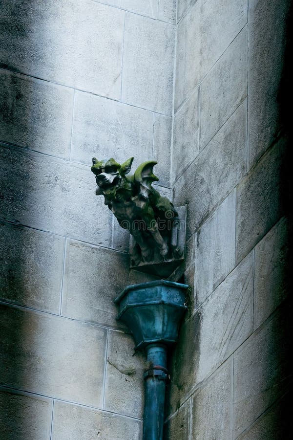 Vertical Shot of a Gargoyle in the Corner of a Building Stock Photo ...