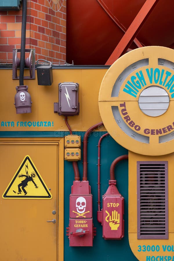 Vertical Shot of a Generator with Different Warning Symbols Stock Image ...