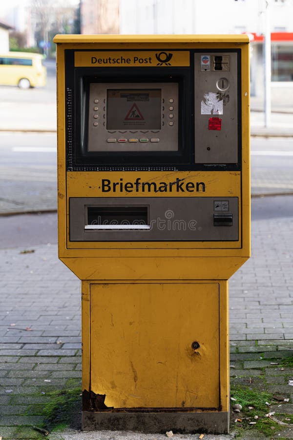 Vertical Shot of a German Post Stamp Machine with Heavy Signs of Use ...