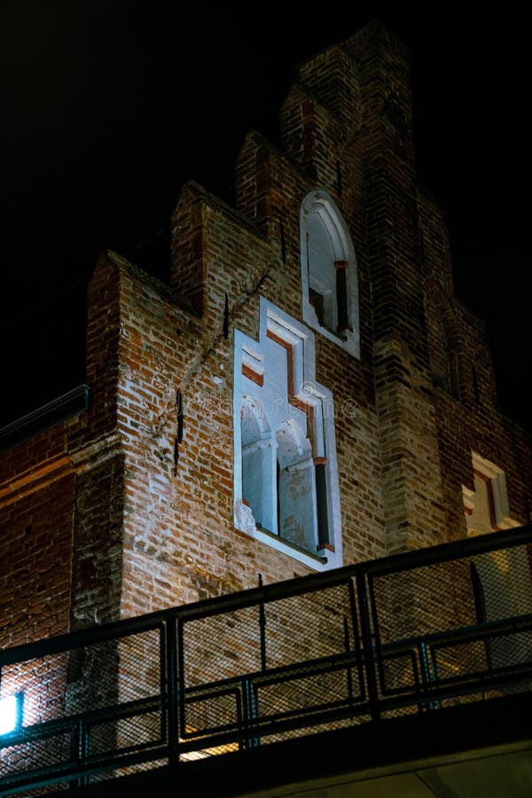 Vertical Shot of Gothic-styled Windows on a Brick Wall Stock Photo ...