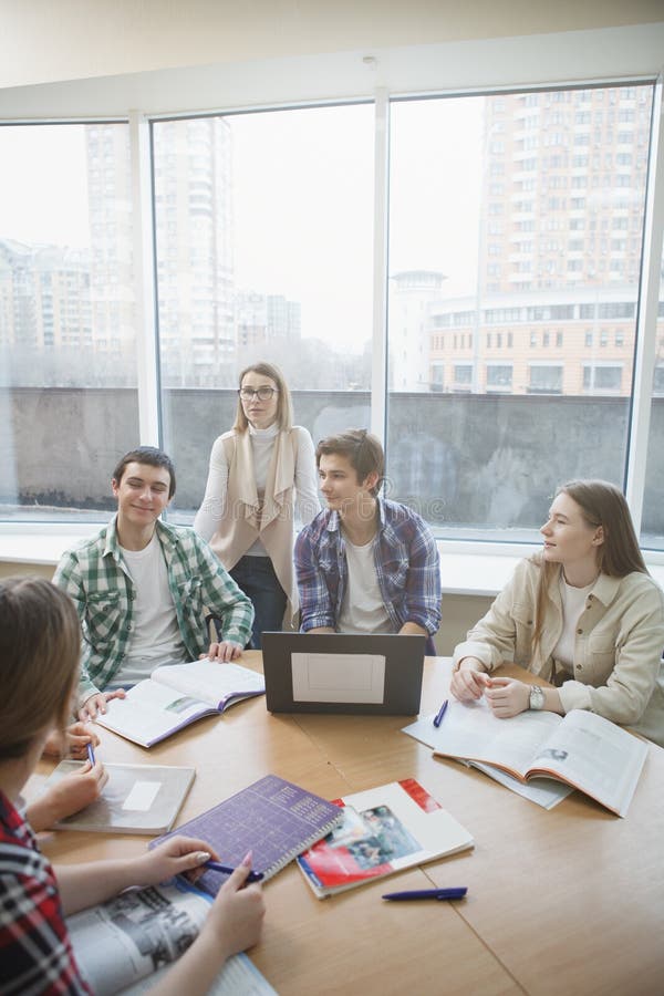 Teacher with College Students in Class Stock Image - Image of computer ...