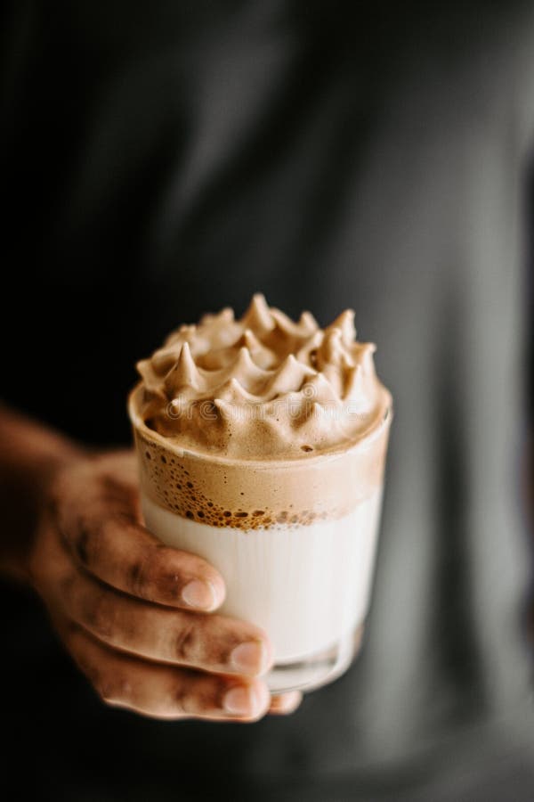 Vertical Shot of a Hand Holding Coffee Frappe Stock Image - Image of ...