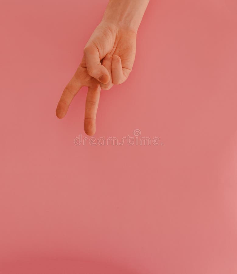 Vertical Shot of a Hand Showing the Peace Sign Stock Image - Image of ...