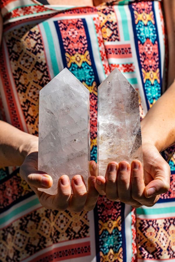 Vertical Shot of Hands Holding Clear Beautiful Crystal Tower Minerals ...