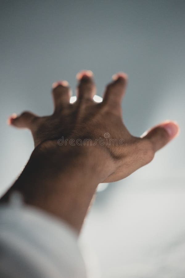Vertical Shot of a Held-out Hand for Wallpaper and Background Stock ...