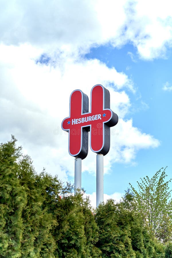 Vertical Shot of the Hesburger Logo Against a Blue Sky Editorial Stock ...