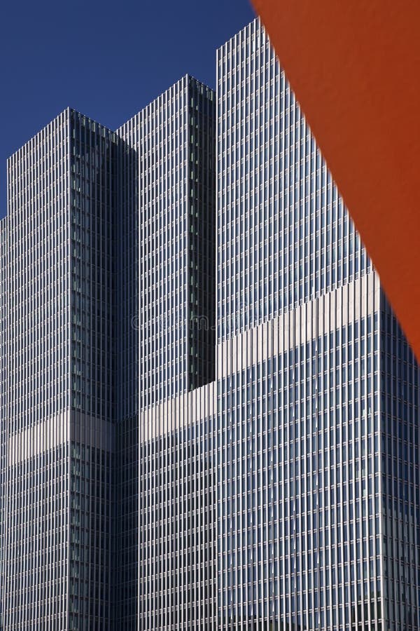 Vertical Shot of a High-rise Building Under the Clear Blue Sky in ...