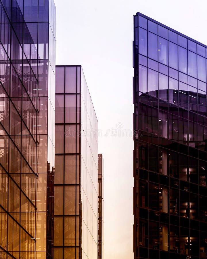 Vertical Shot of High Rise Buildings in a Glass Facade with Reflective ...