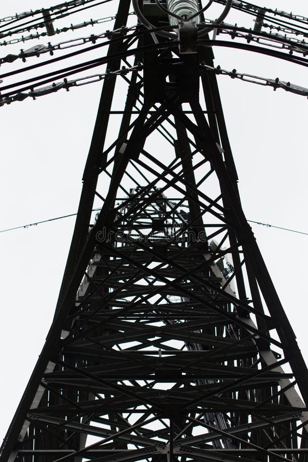 Vertical Shot of a High Voltage Transmission Electrical Tower on a ...