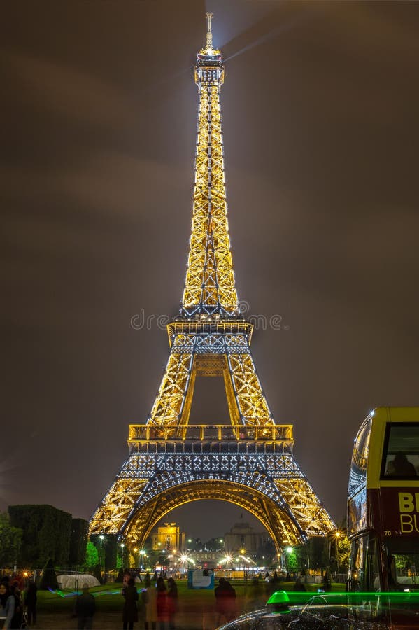 Vertical Shot of the Illuminated Eiffel Tower at Night - Great for a ... Vertical Shot of the Illuminated Eiffel Tower at Night - Great for a ...