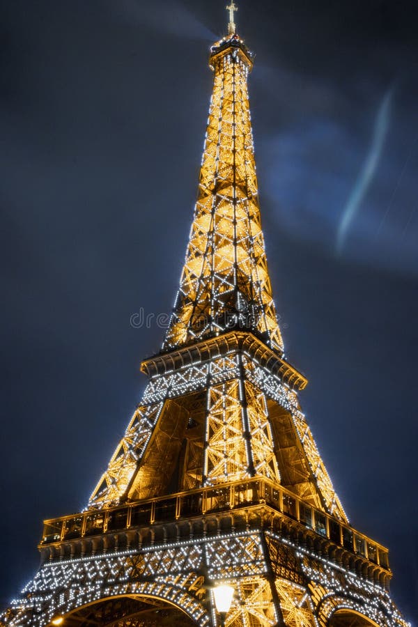 Vertical Shot of the Illuminated Eiffel Tower at Night. Editorial Image ... Vertical Shot of the Illuminated Eiffel Tower at Night. Editorial Image ...
