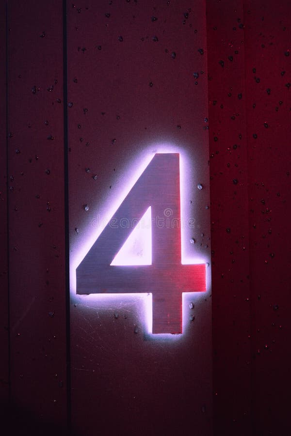 Vertical Shot of an Illuminated Number Four Stock Image - Image of ...