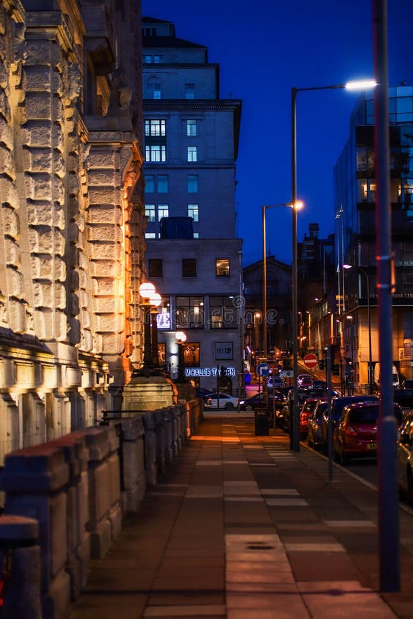 Vertical Shot of an Illuminated Road at Night in Liverpool, United ... Vertical Shot of an Illuminated Road at Night in Liverpool, United ...
