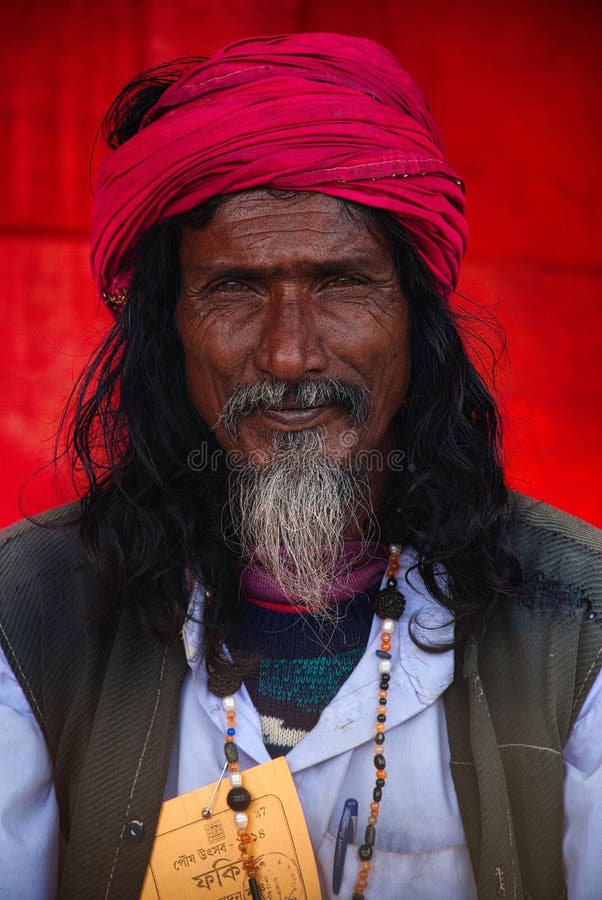 Vertical Shot of an Indian Male with Beard Looking at the Camera ...