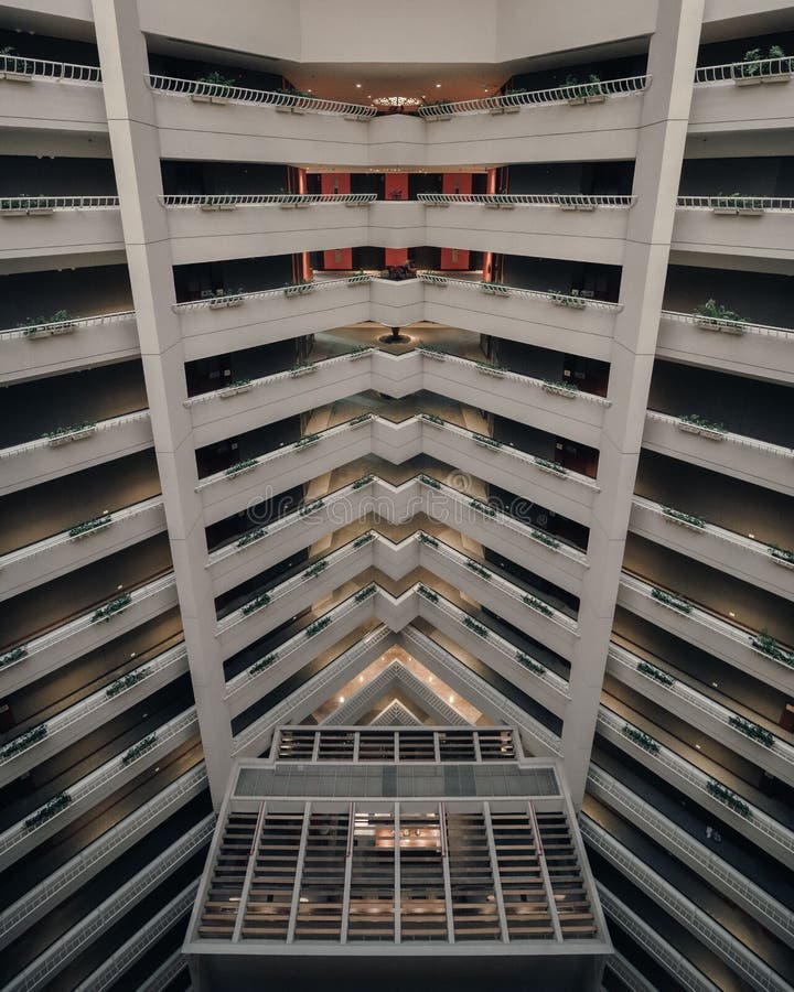 Vertical Shot of the Interior of a Modern Building S Balconies in ...