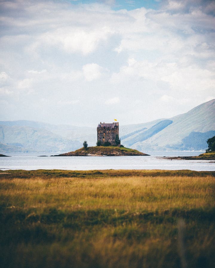 Vertical Shot of an Isolated Castle in Scotland during Daylight Stock ...