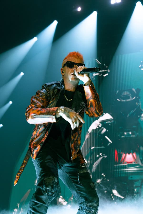Vertical Shot of Italian Rapper Salmo Performing on Stage at Unipol ... Vertical Shot of Italian Rapper Salmo Performing on Stage at Unipol ...