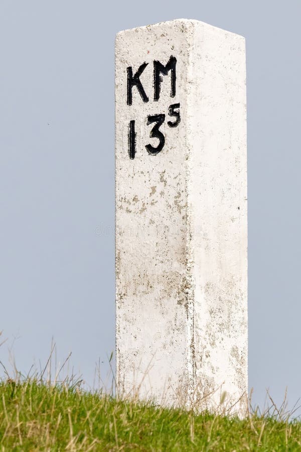 Vertical Shot of a Kilometer Pole on the Roadside Stock Image - Image ...