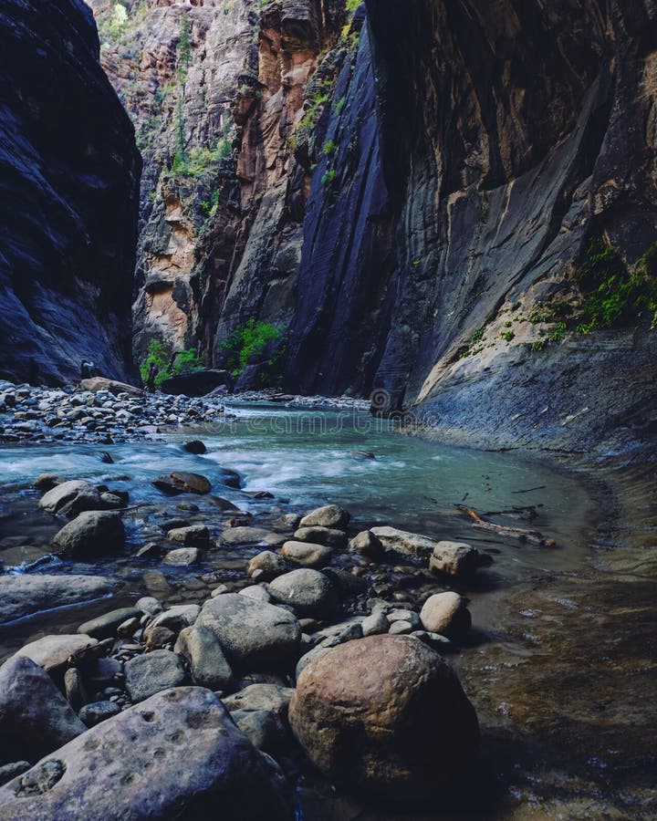 Vertical Shot of a Lake with Rock Formations Stock Photo - Image of ...