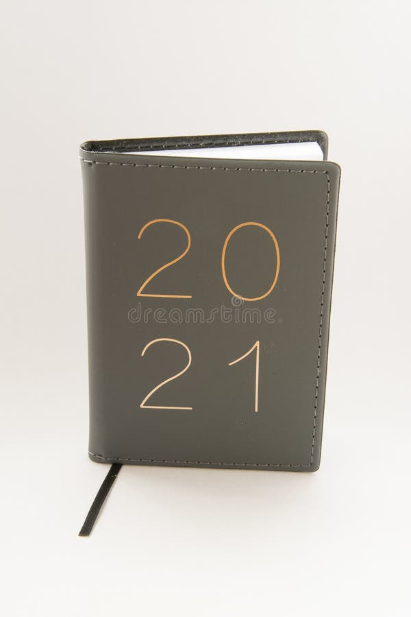 Vertical Shot of a Leather Journal with 2021 Writing on the Cover on a ...