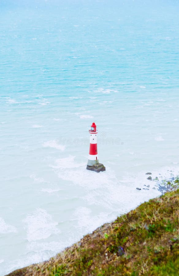 Vertical Shot of a Lighthouse in the Open Sea Stock Photo - Image of ...