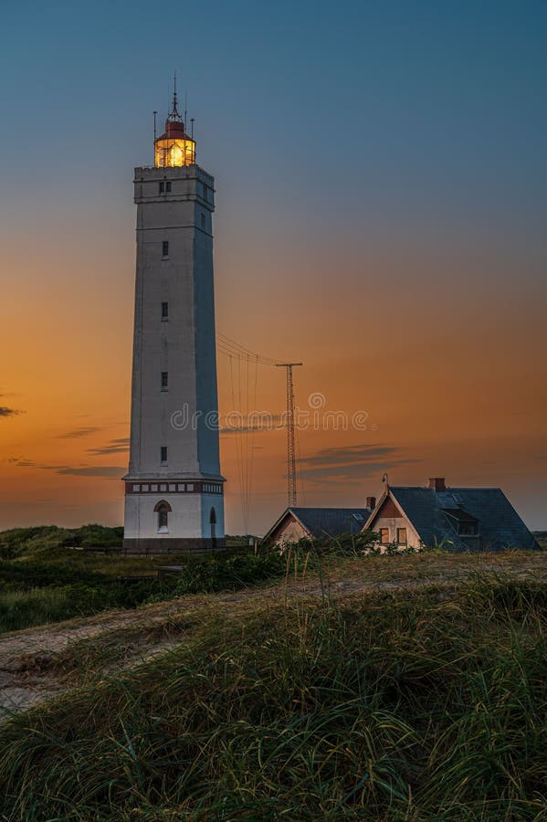 Vertical Shot of a Lighthouse after Sunset from Blavand in Denmark ...