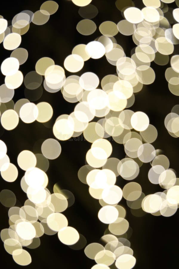 Vertical Shot of Lights with Bokeh Effect on the Dark Background Stock ...