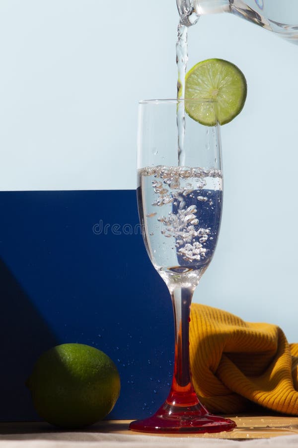Vertical Shot of Liquid Pouring into a Fancy Cocktail Stock Photo ...