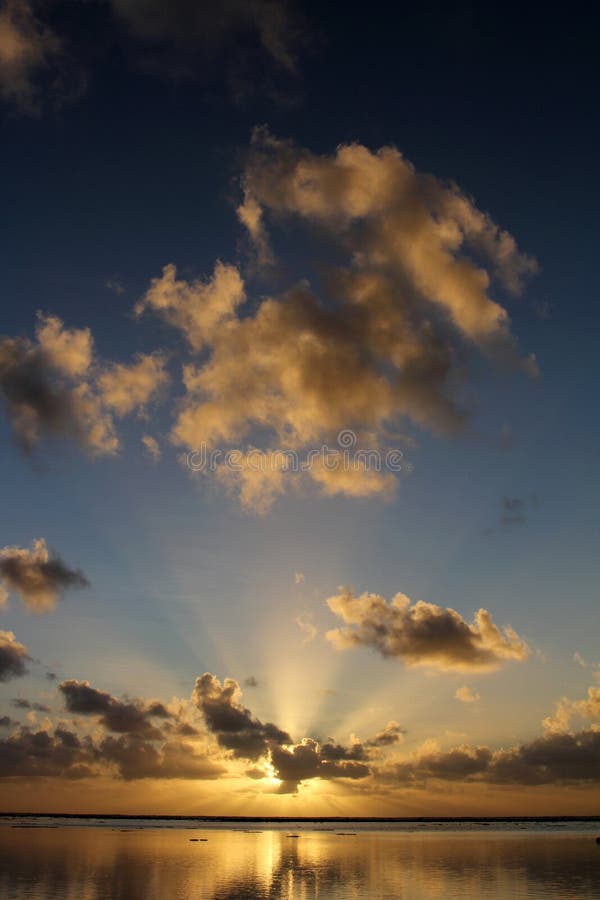 Vertical Shot of the Magical Setting of the Sun in Rarotonga Stock ...