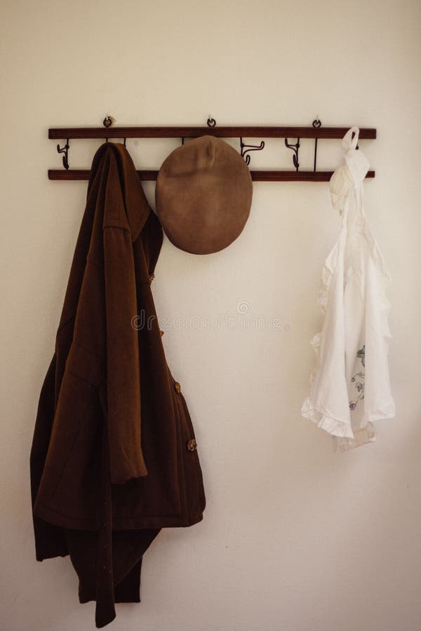 Vertical Shot of a Male Suit and Jacket Hung on the Hangers Stock Image ...