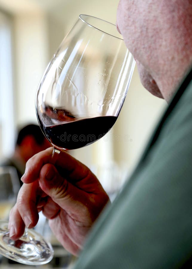 Vertical Shot of a Man Drinking a Glass of Red Wine Stock Image - Image ...