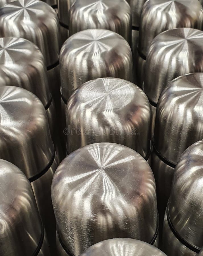 Vertical Shot of Many Round Metal Boxes in a Bunch Stock Photo - Image ...