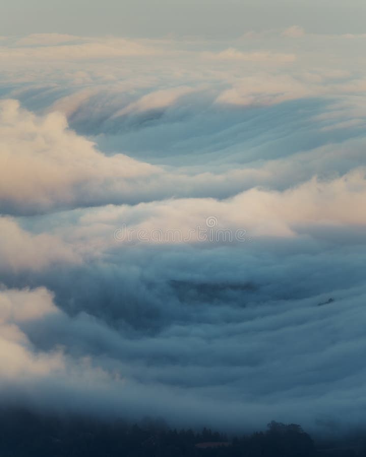 Vertical Shot of a Mesmerizing Cloudscape Stock Photo - Image of mist ...