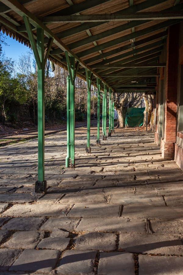 Vertical Shot of a Metal Capony by a Building Stock Image - Image of ...