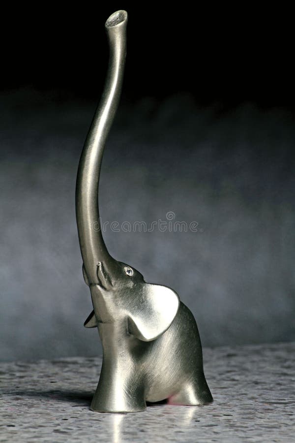 Vertical Shot of a Metal Elephant Ring Holder with Raised Trunk ...