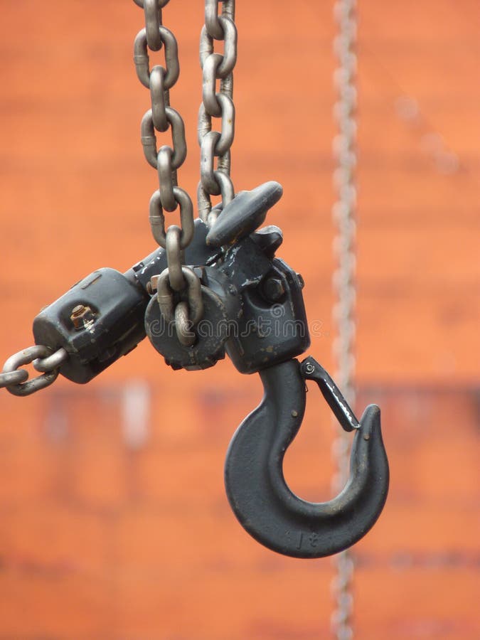 Vertical Shot of a Metal Hook with Chains Attached To it Stock Photo ...