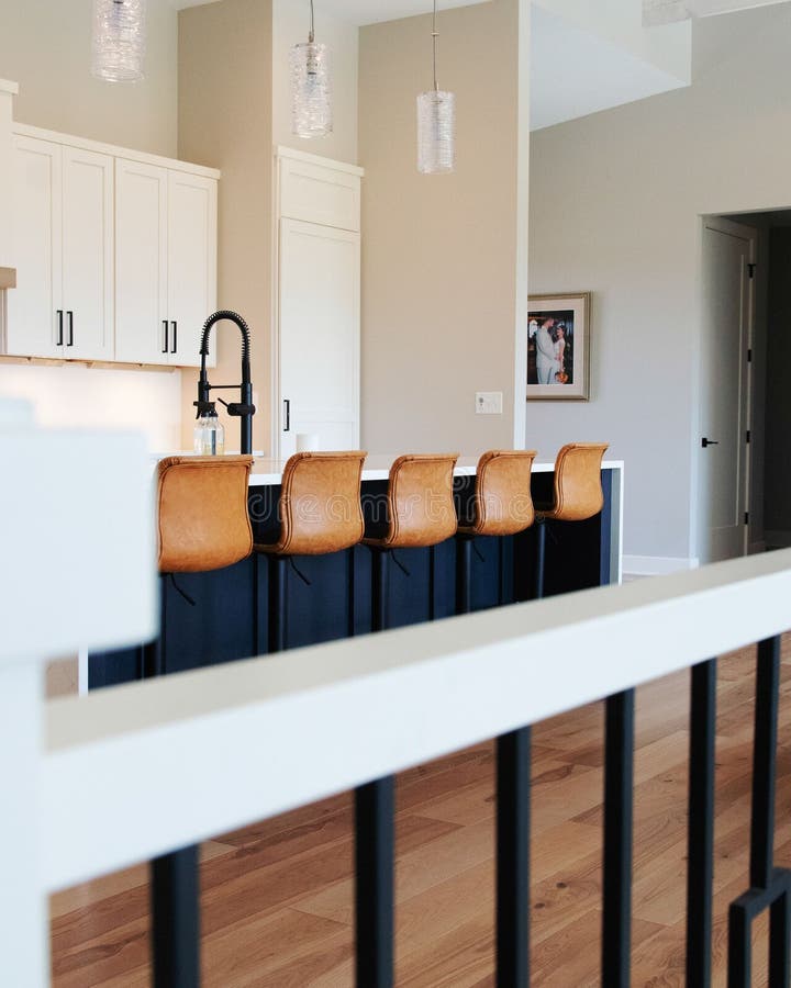 Vertical Shot of a Minimalistic Kitchen Interior with White Shelves ...