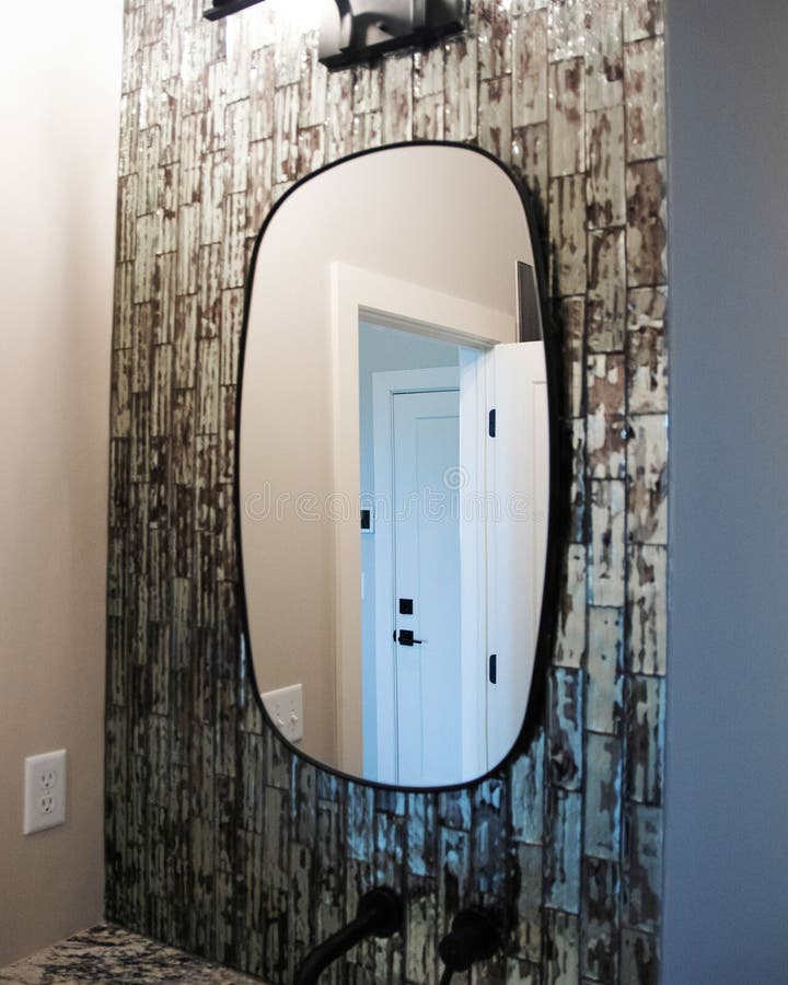 Vertical Shot of a Mirror in a House with a Modern Interior Design ...